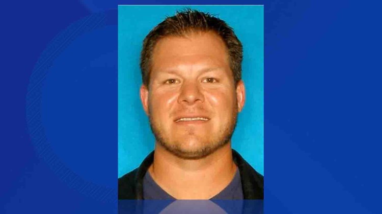 Father accused of trying to run over security guard turns himself in ...