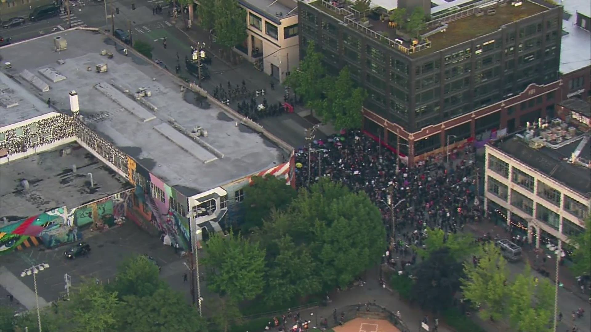 Man shot after suspect drives through crowd during Seattle protest ...