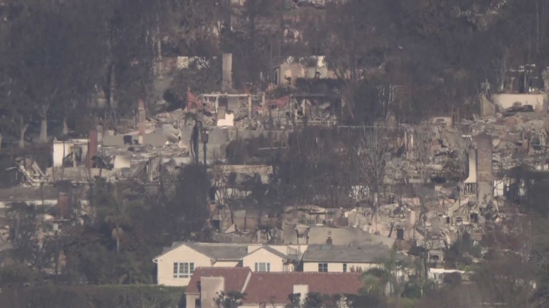 Smoking rubble spotted after fires devastate areas of Los Angeles ...