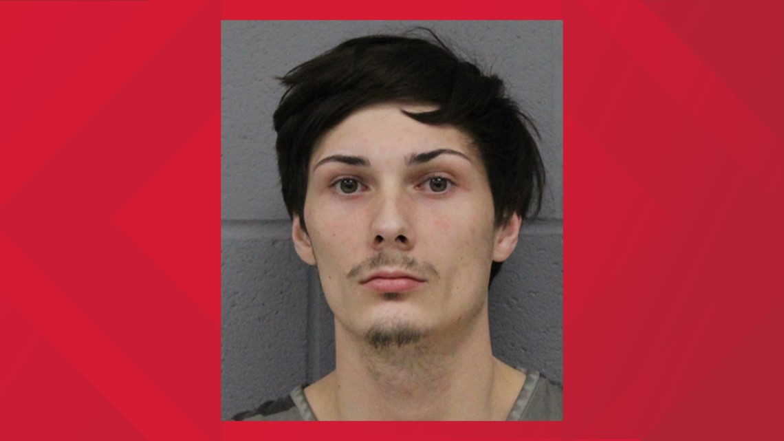 Austin man arrested for road rage incident had 19 guns in home | cbs19.tv