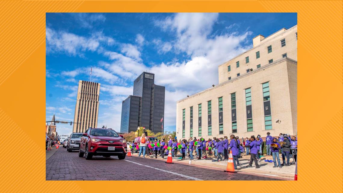 Drive-thru parade replaces annual Christmas event, draws hundreds ...