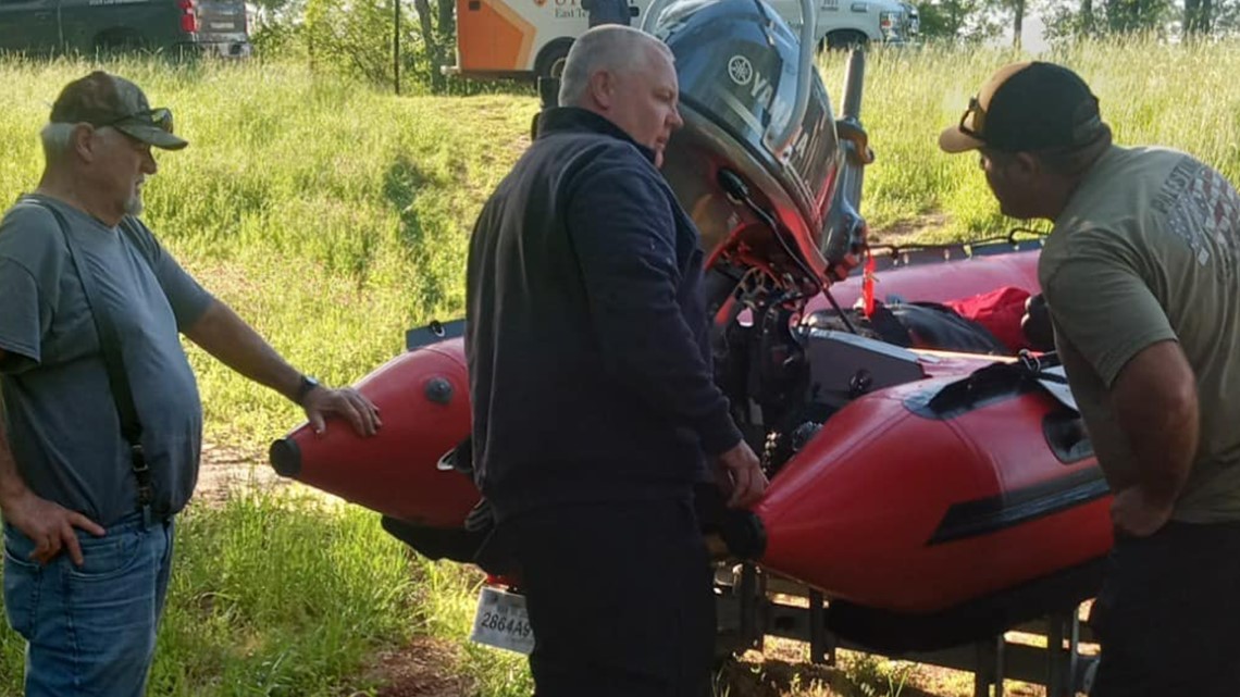 Officials rescue woman who hung onto tree in river overnight | cbs19.tv