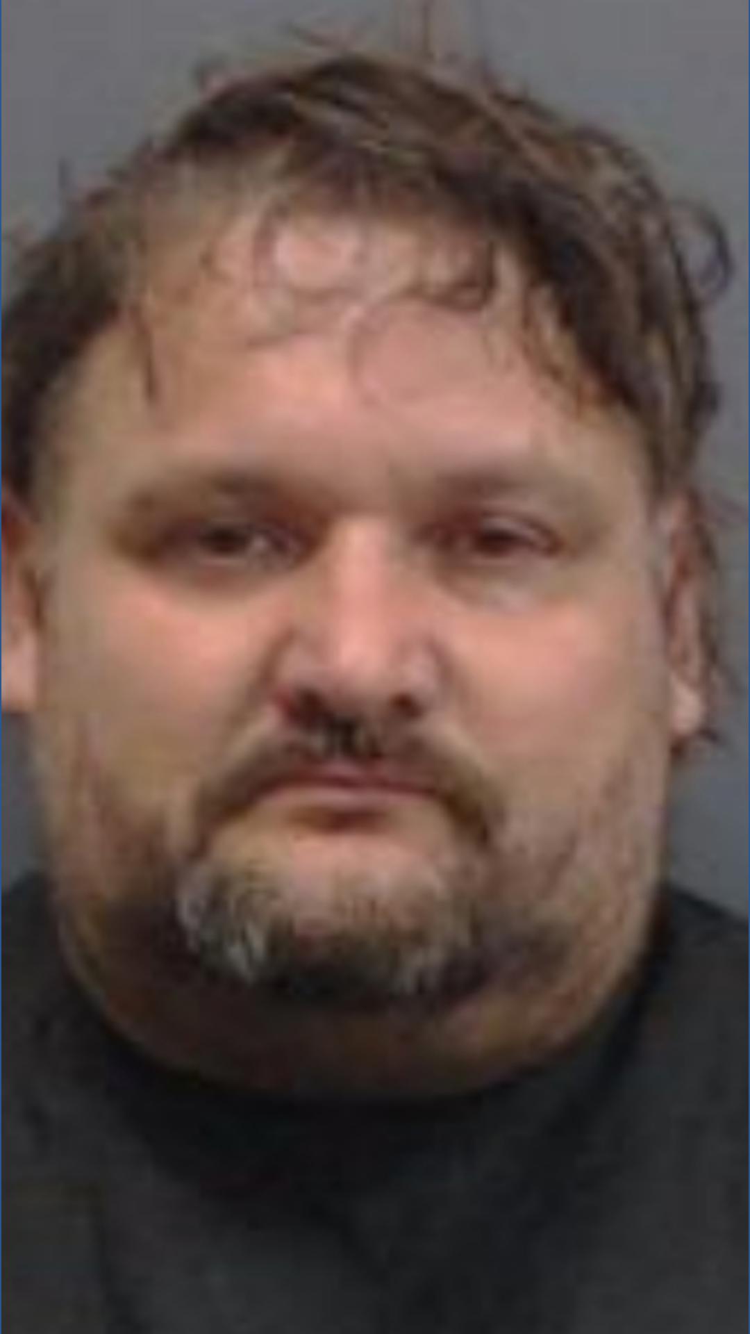 Longview man pleads guilty to firing at police vehicle in officer ...