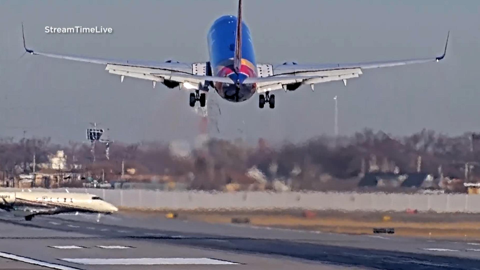 WATCH: Southwest Plane, private jet nearly collide at Chicago airport ...
