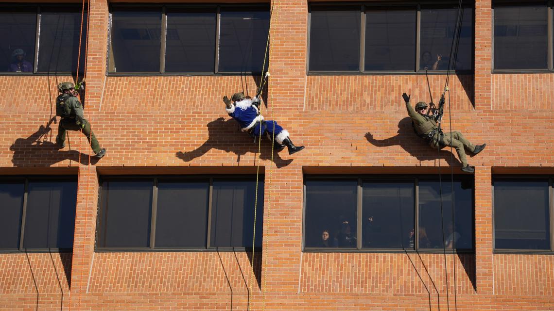 Blue Santa and SWAT team officers bring joy to Longview hospital | cbs19.tv