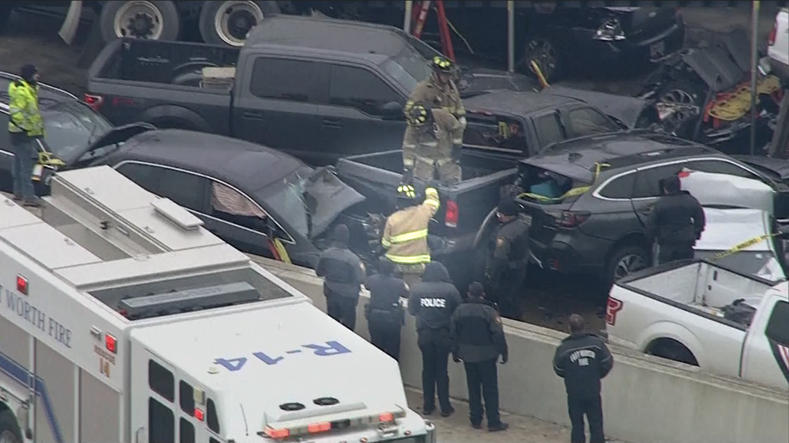 Watch: Firefighter saves dog from truck hours after deadly pileup in ...